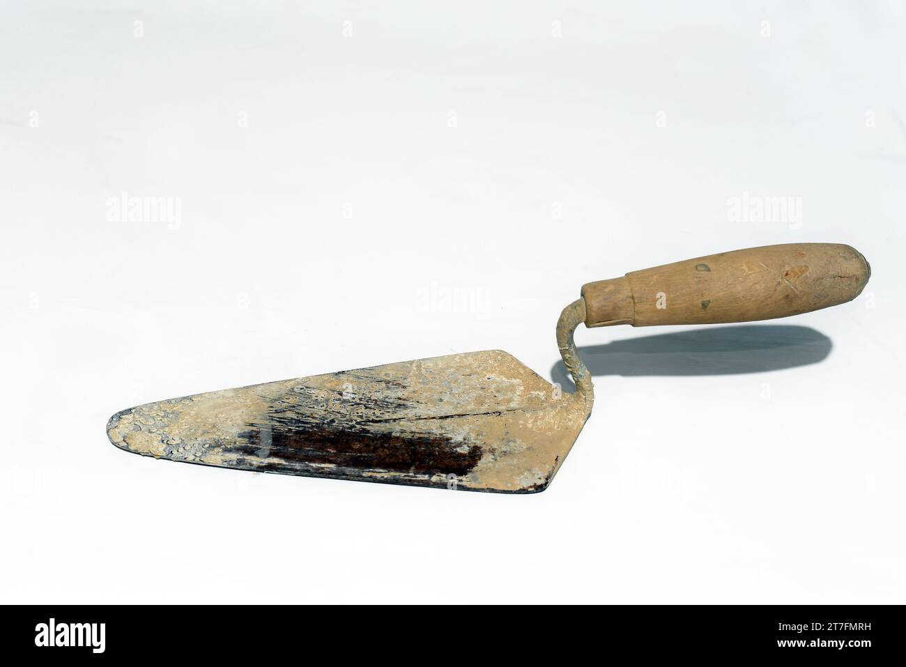 Construction spatula used on a white background. Looking up Stock Photo ...