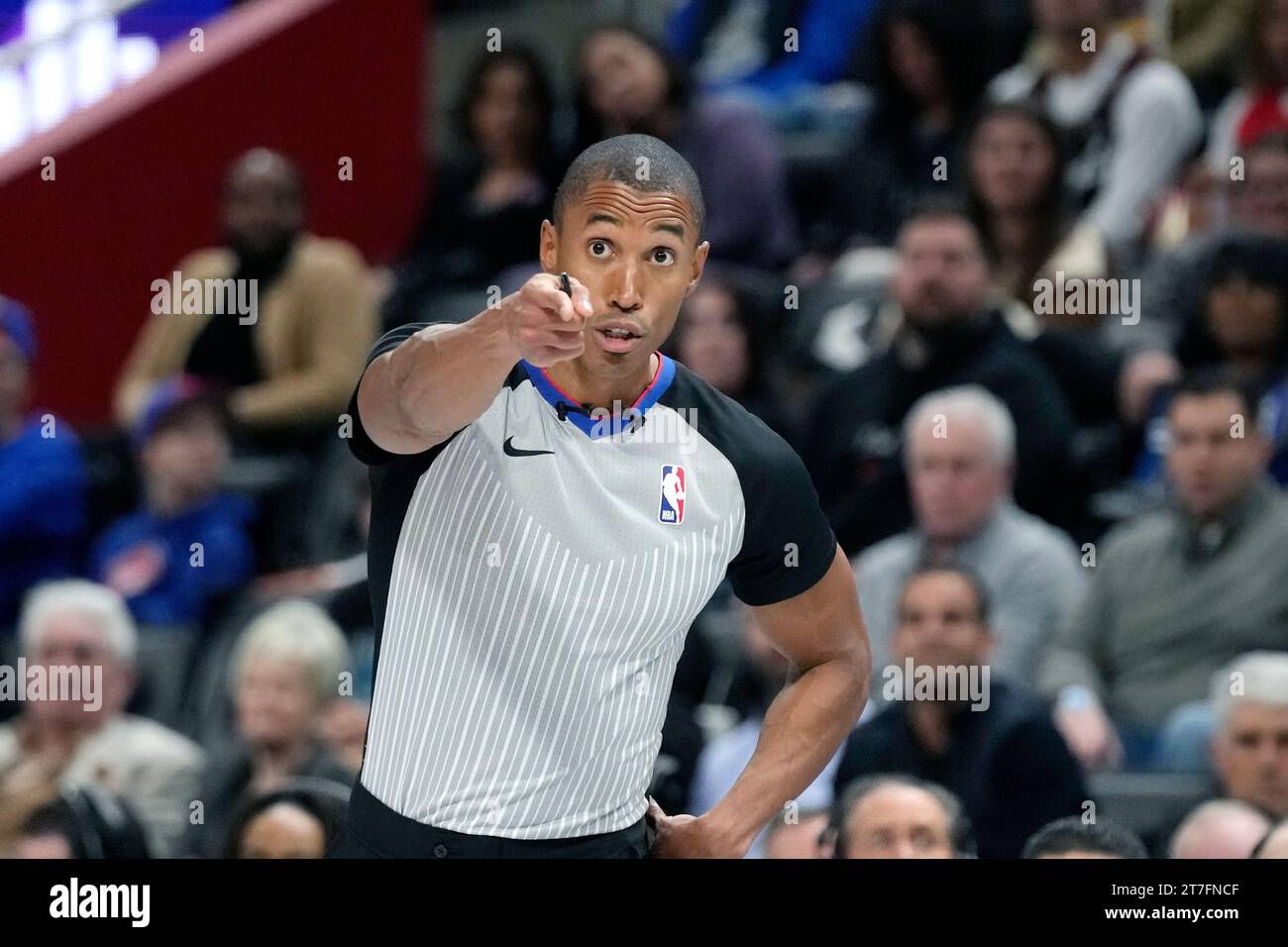 Referee Robert Hussey signals during the first half of an NBA ...