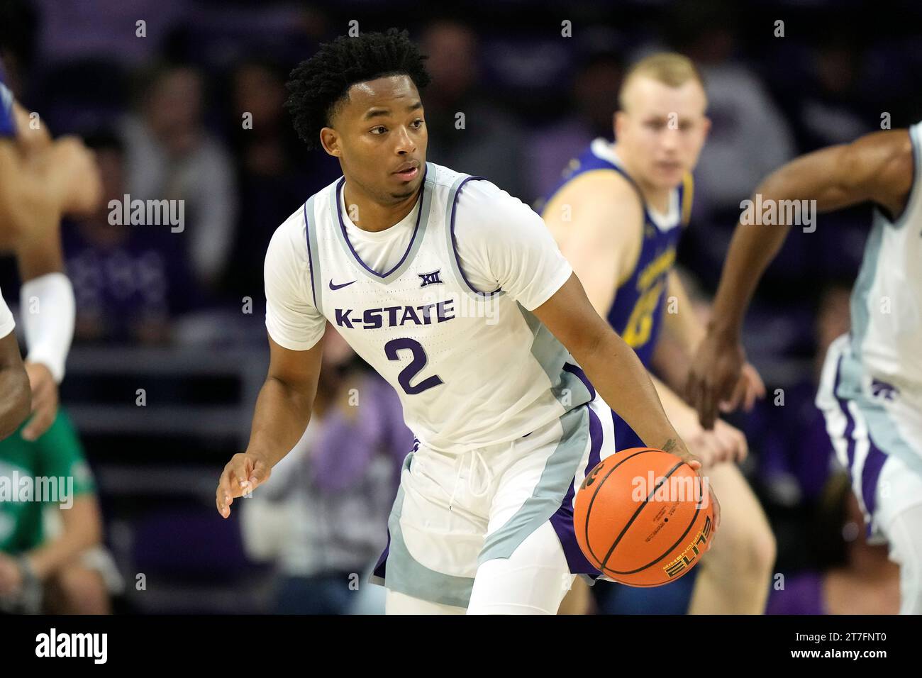 Kansas State guard Tylor Perry drives during the second half of an NCAA ...