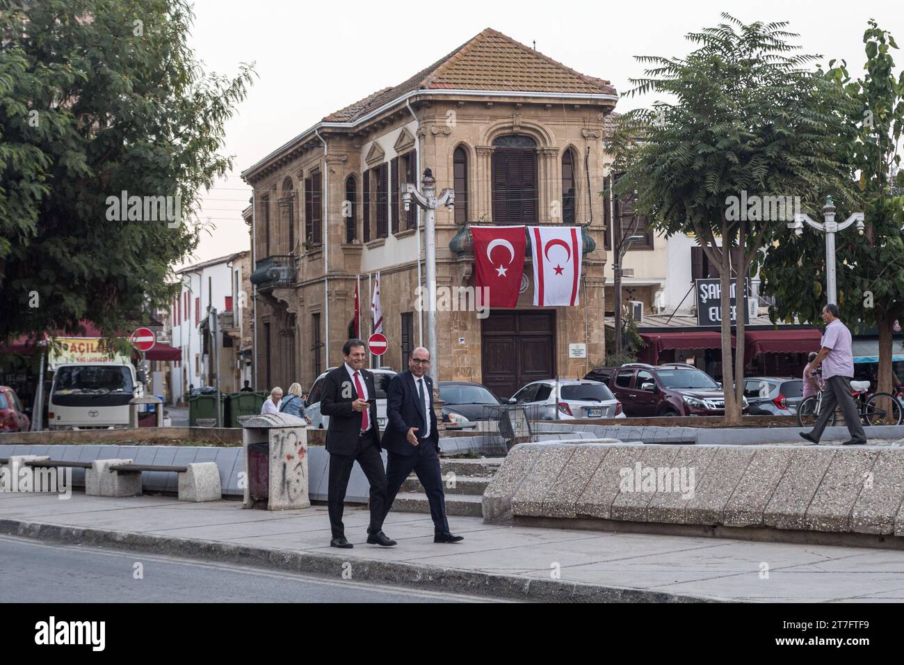 Nicosia, Nicosia, Cyprus. 15th Nov, 2023. Two men are walking in front ...