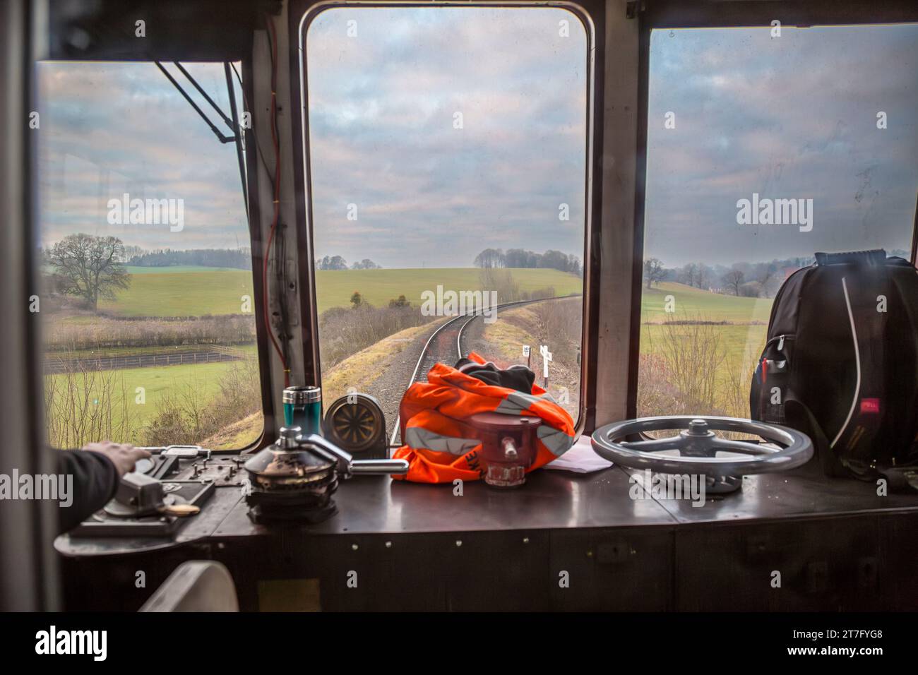 Driving view from the front of a diesel locomotive travelling along ...