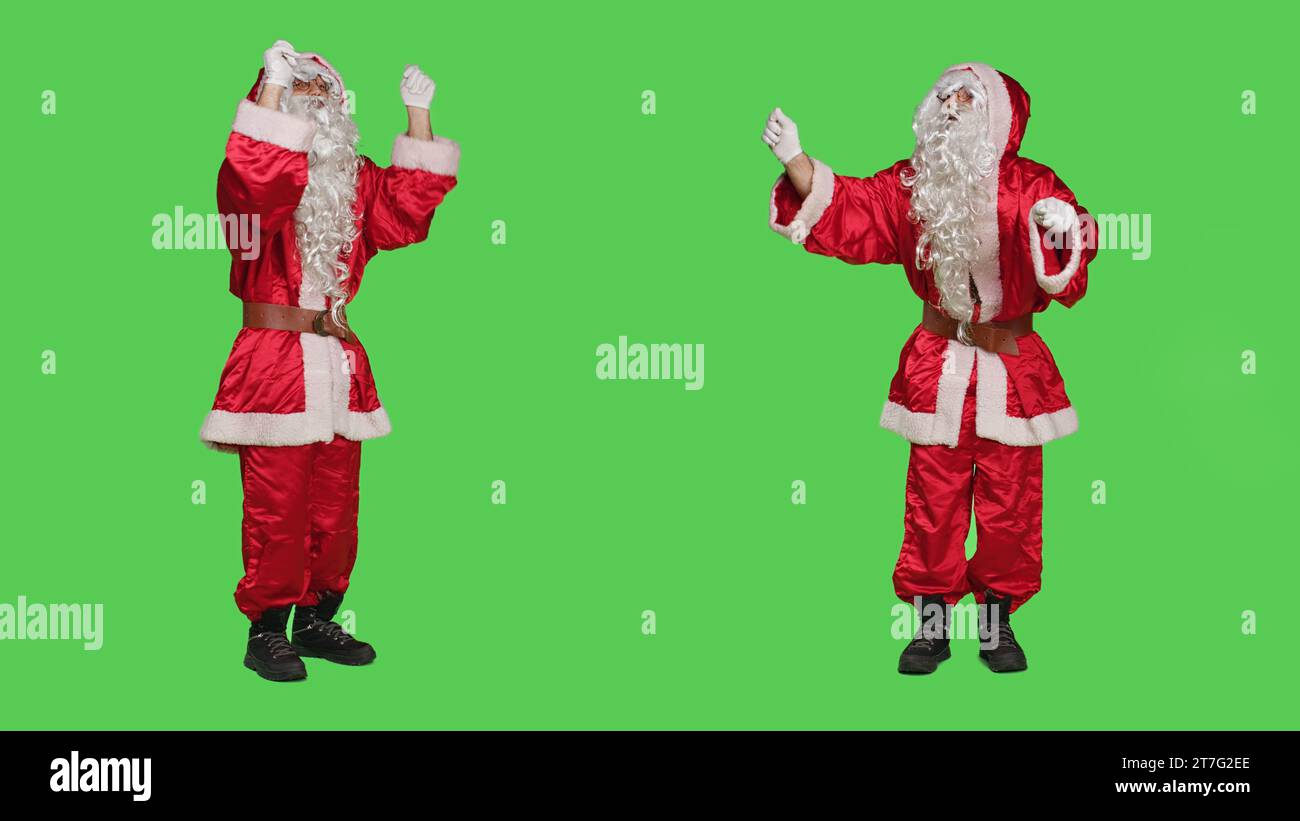 Santa choirmaster conducting band, conductor in winter seasonal costume ...