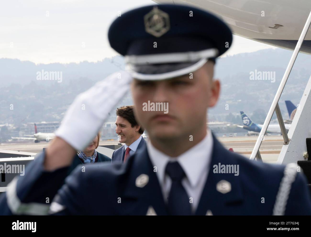 An honor guard member salutes as Canada Prime Minister Justin Trudeau ...