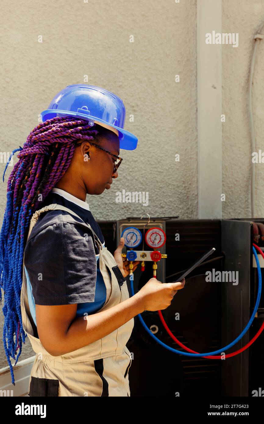 Expert repairman contracted by business owner to detect condenser ...