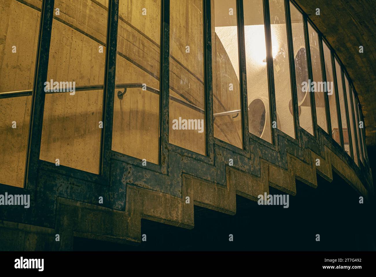 Glass window with stairs visible from the outside. Construction and ...