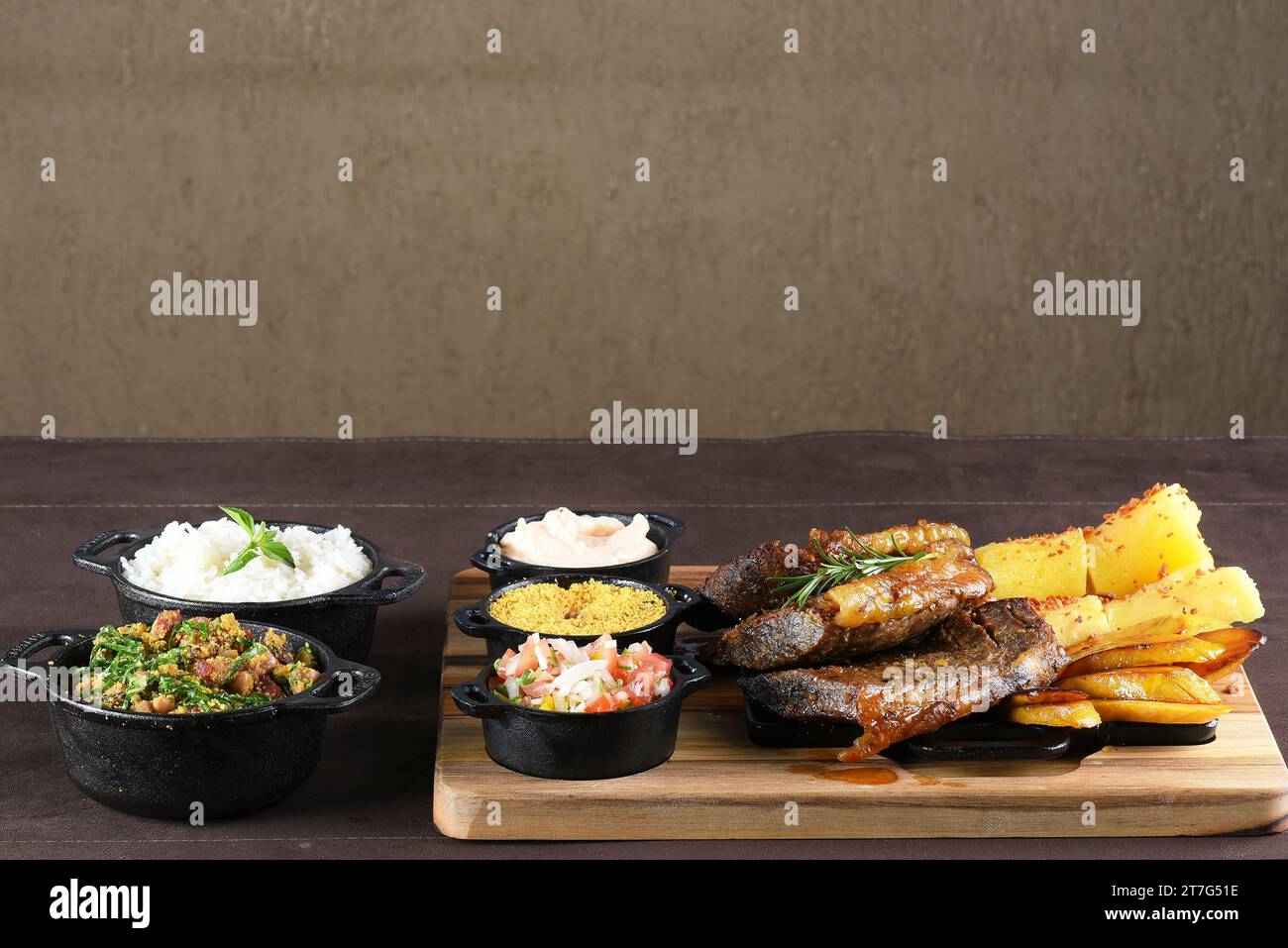 barbecue roast beef with rice, boiled cassava salad, farofa and beans ...