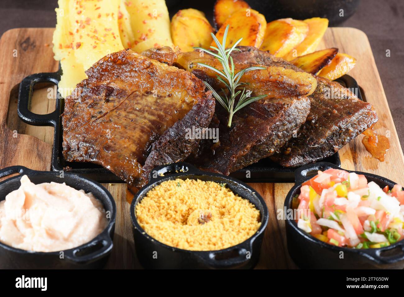 barbecue roast beef with rice, boiled cassava salad, farofa and beans ...
