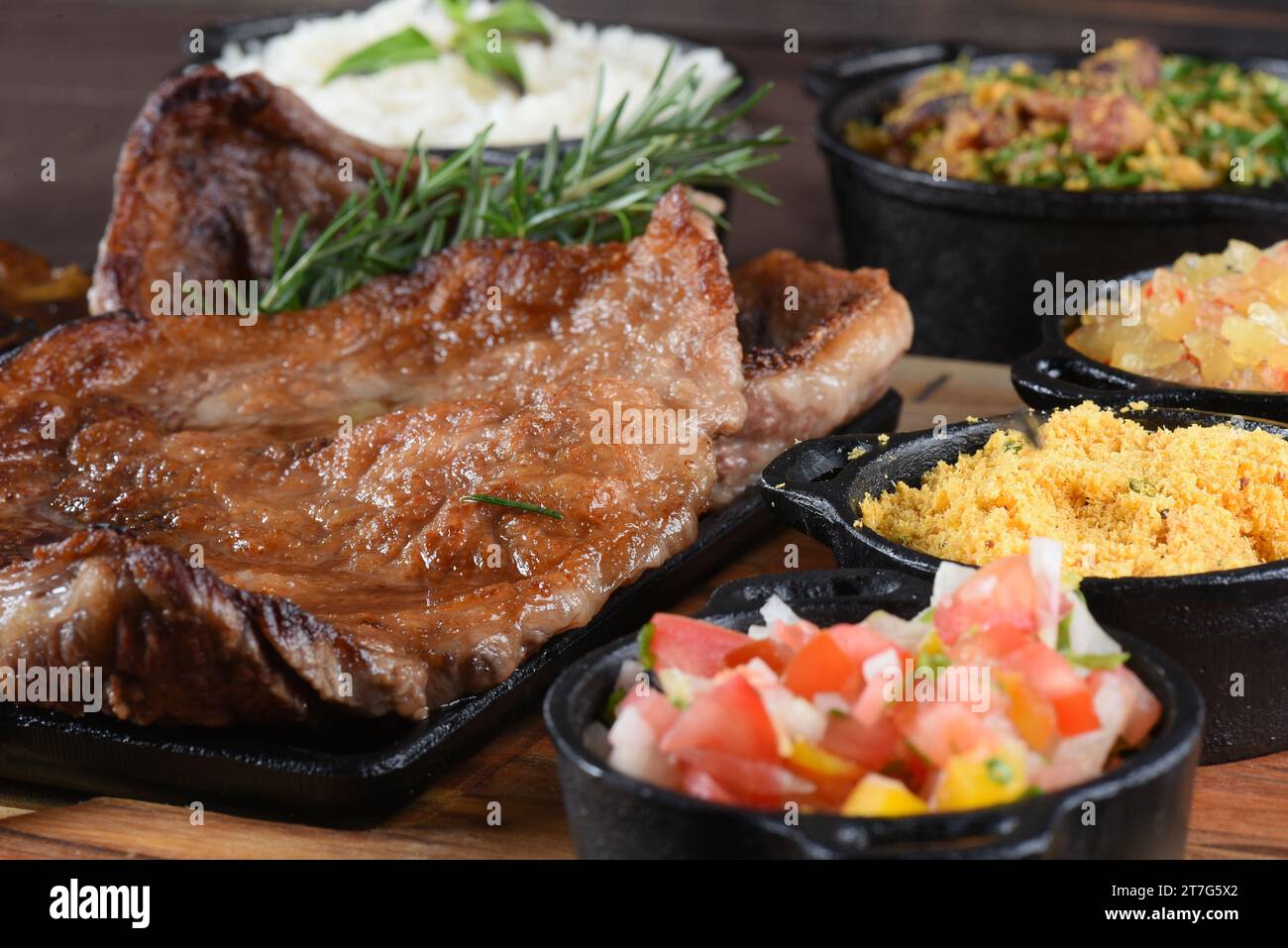 Grilled Chuck Eye Roll Steak roasted on a chopping board. bbq barbecue ...