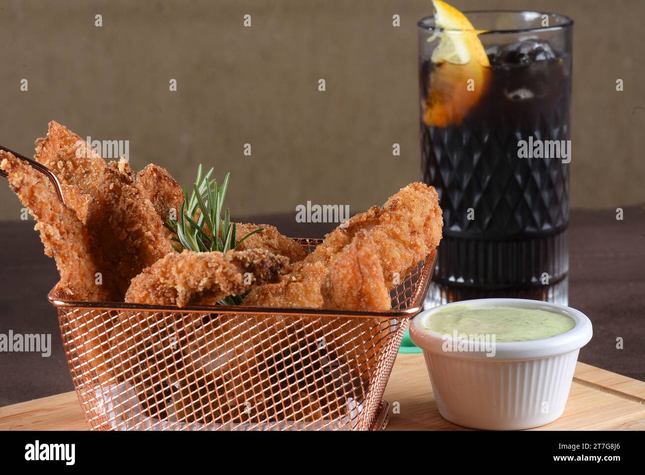 delicious pieces of fried fish breaded with flour Stock Photo - Alamy