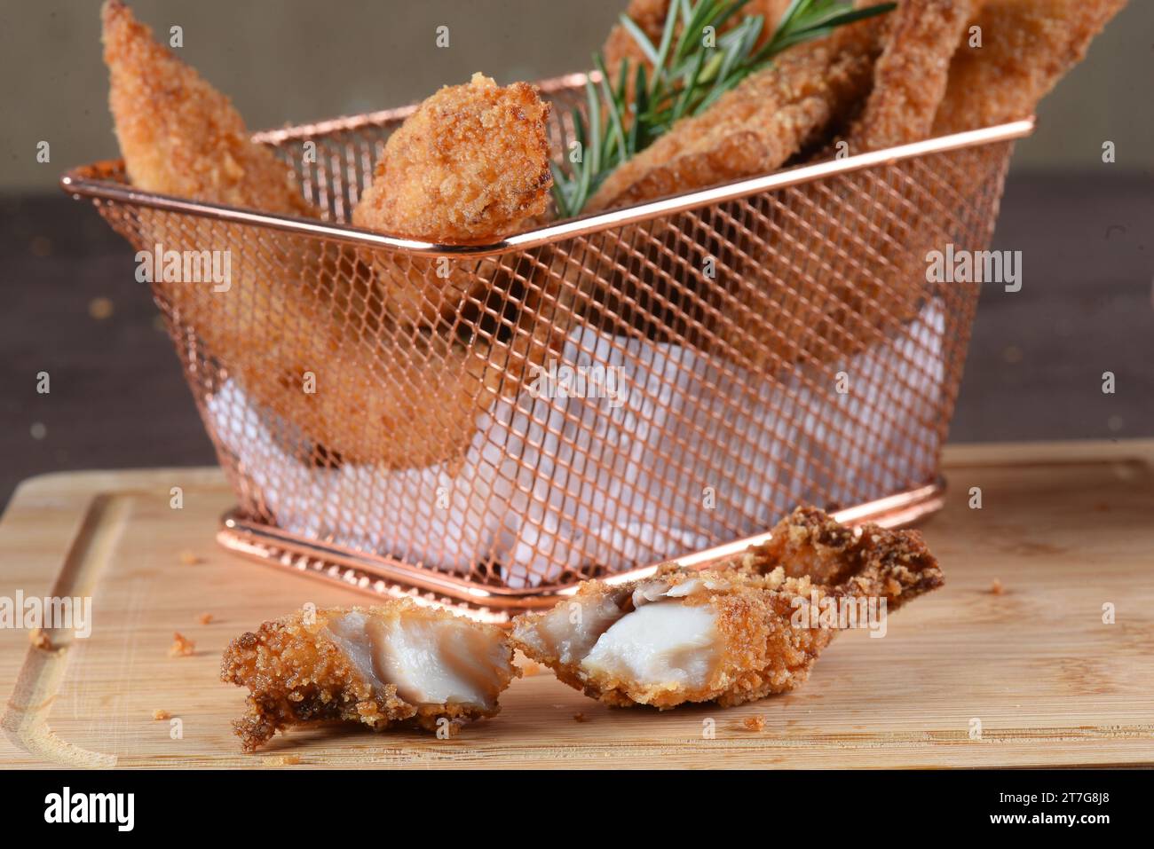 delicious pieces of fried fish breaded with flour Stock Photo - Alamy