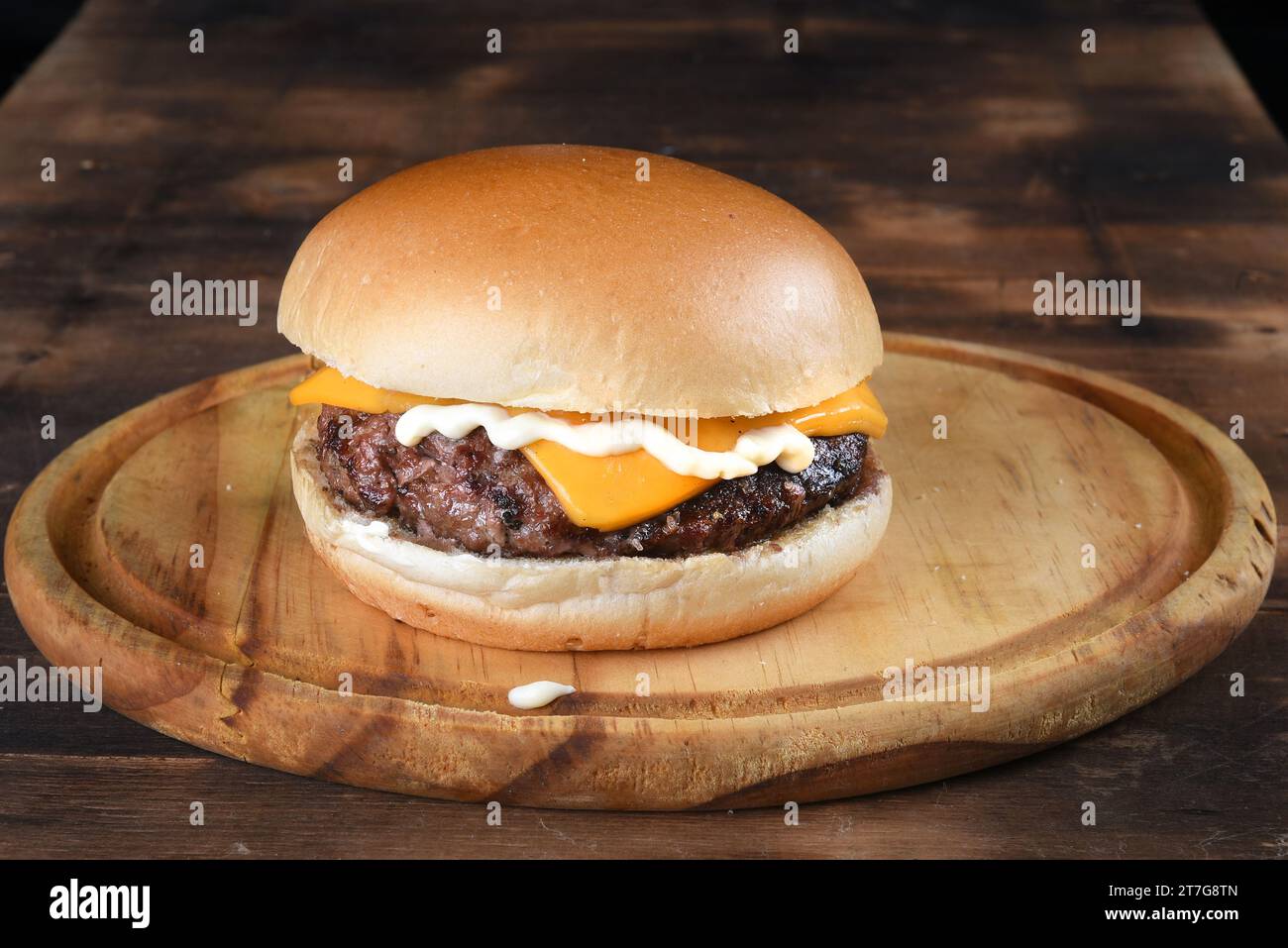 sandwich with beef burger on brioche bread salad egg and bacon street ...