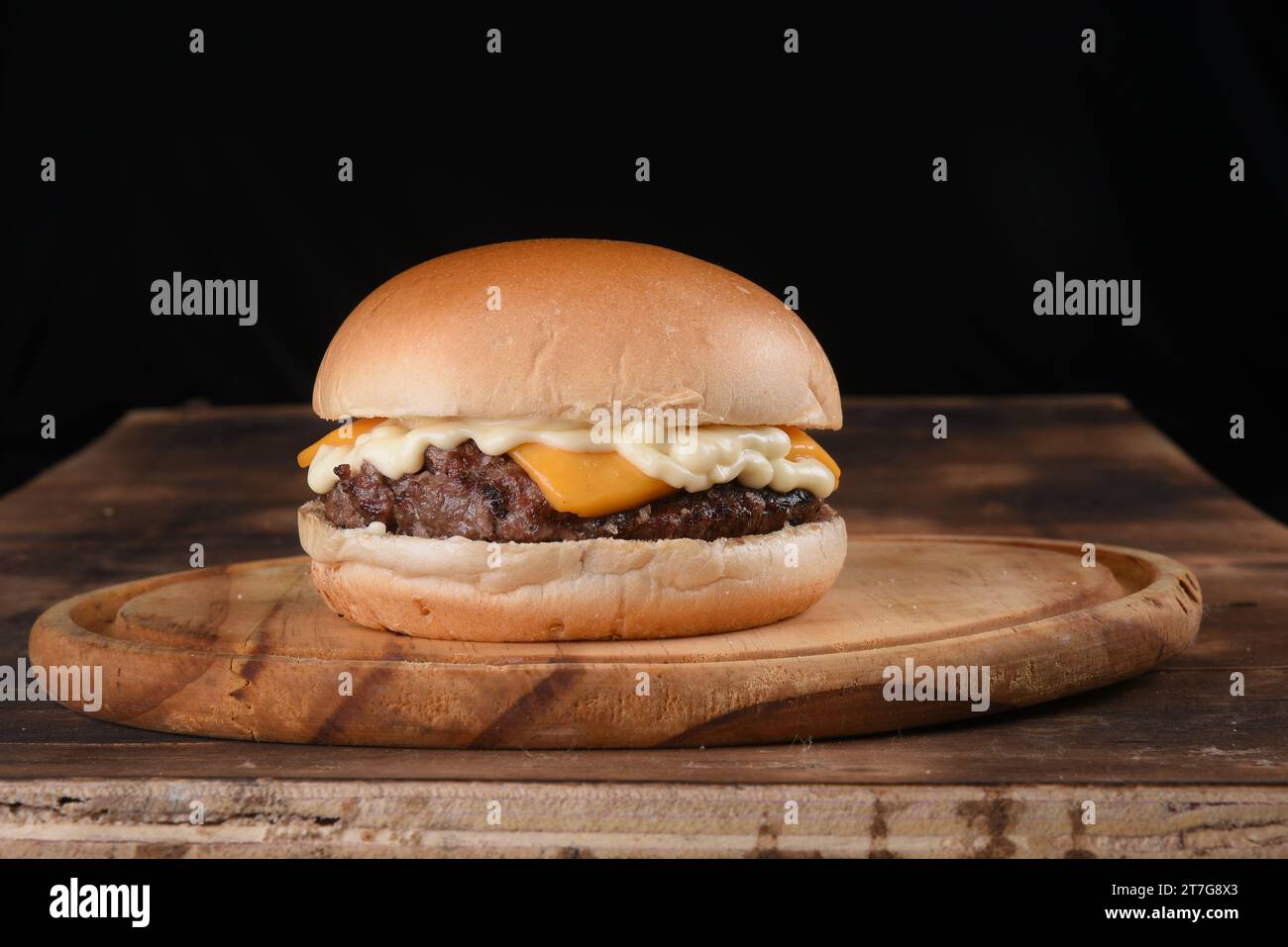 beef burger sandwich with bacon cheese salad and soft egg bun, side ...