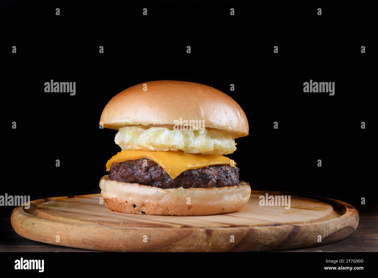 beef burger sandwich with bacon cheese salad and soft egg bun, side ...