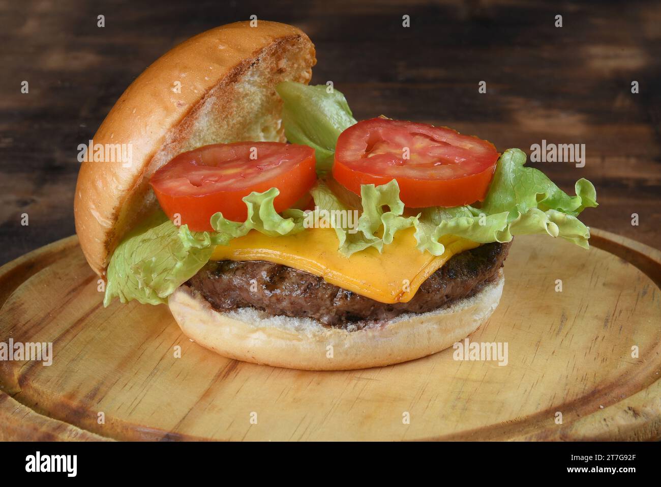 beef burger sandwich with bacon cheese salad and soft egg bun, side ...