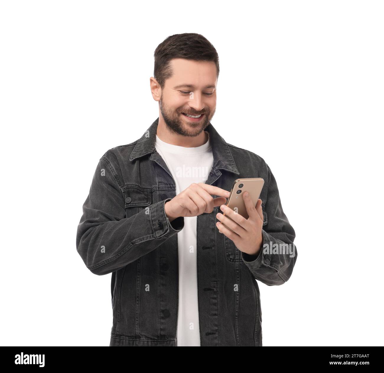 Happy man sending message via smartphone on white background Stock ...