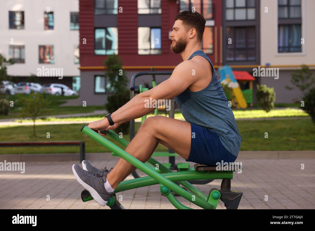 Male athlete on rowing machine hi-res stock photography and images - Alamy