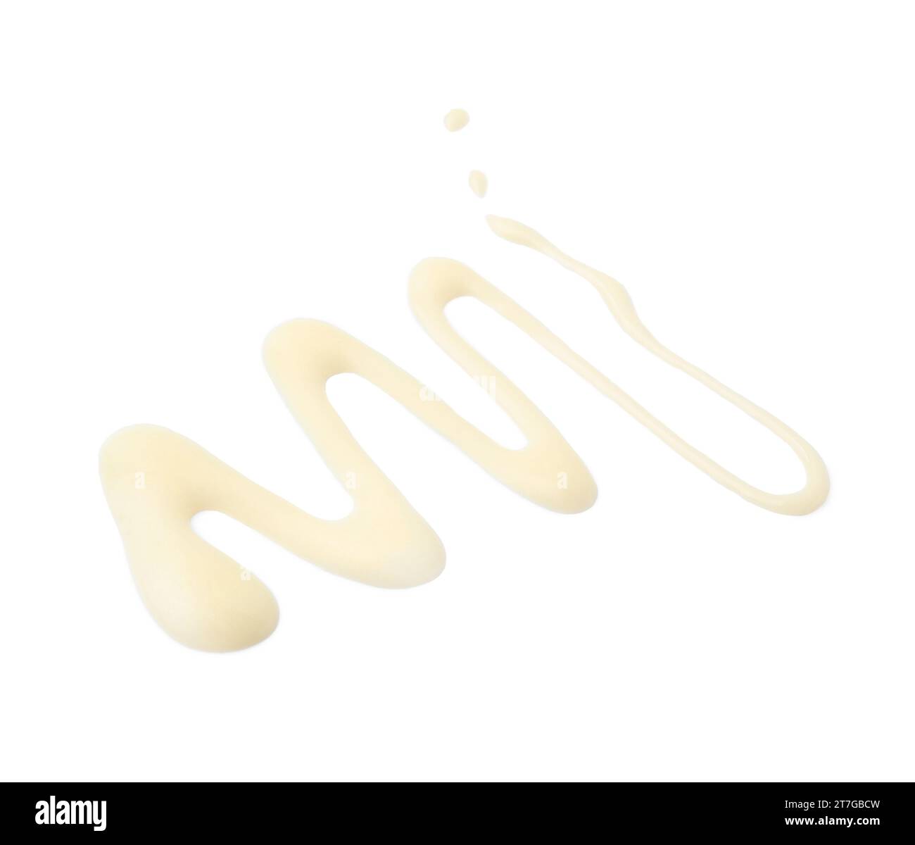 Spilled tasty condensed milk isolated on white Stock Photo - Alamy