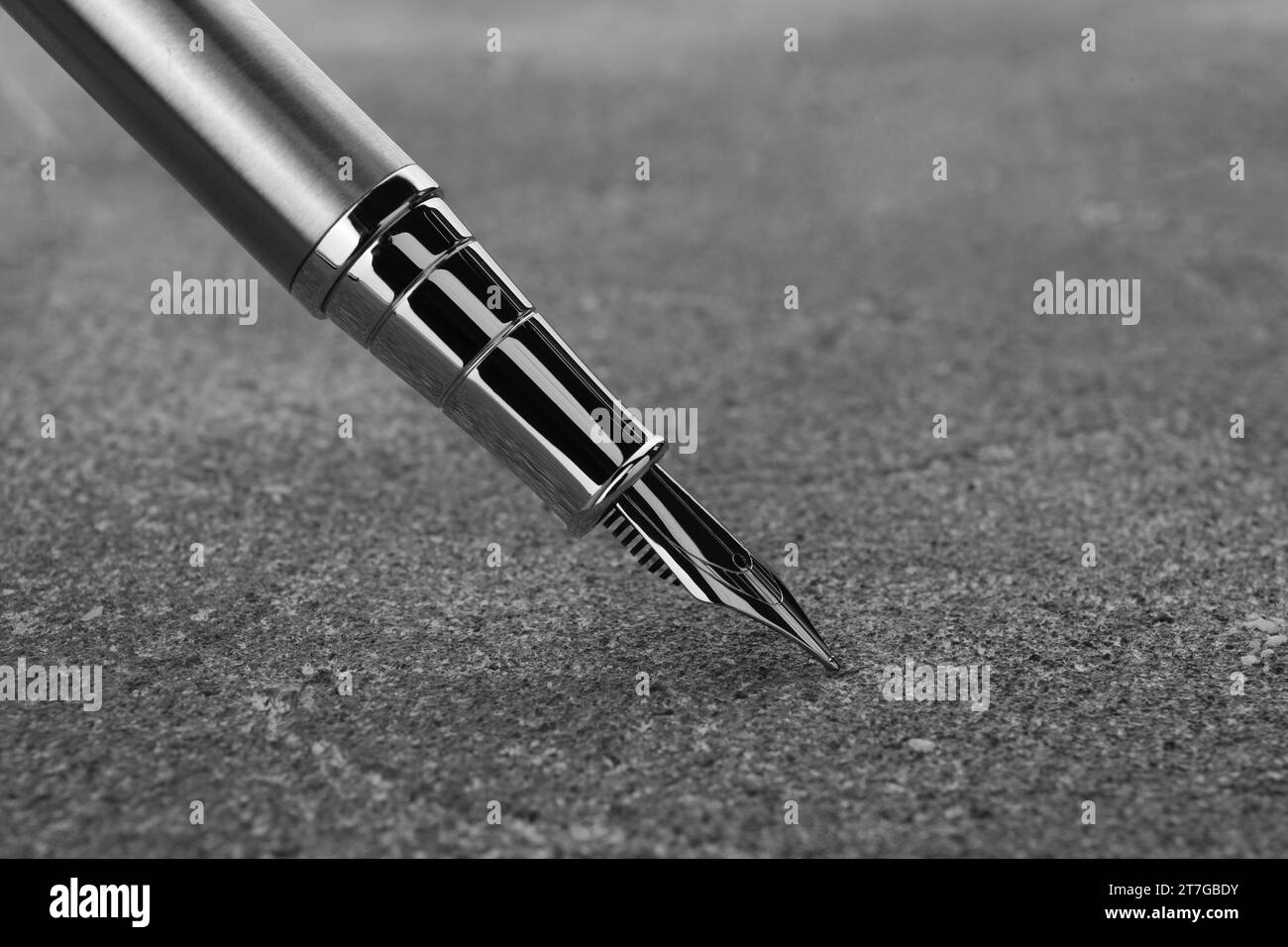 Stylish silver fountain pen on grey textured table, closeup Stock Photo ...