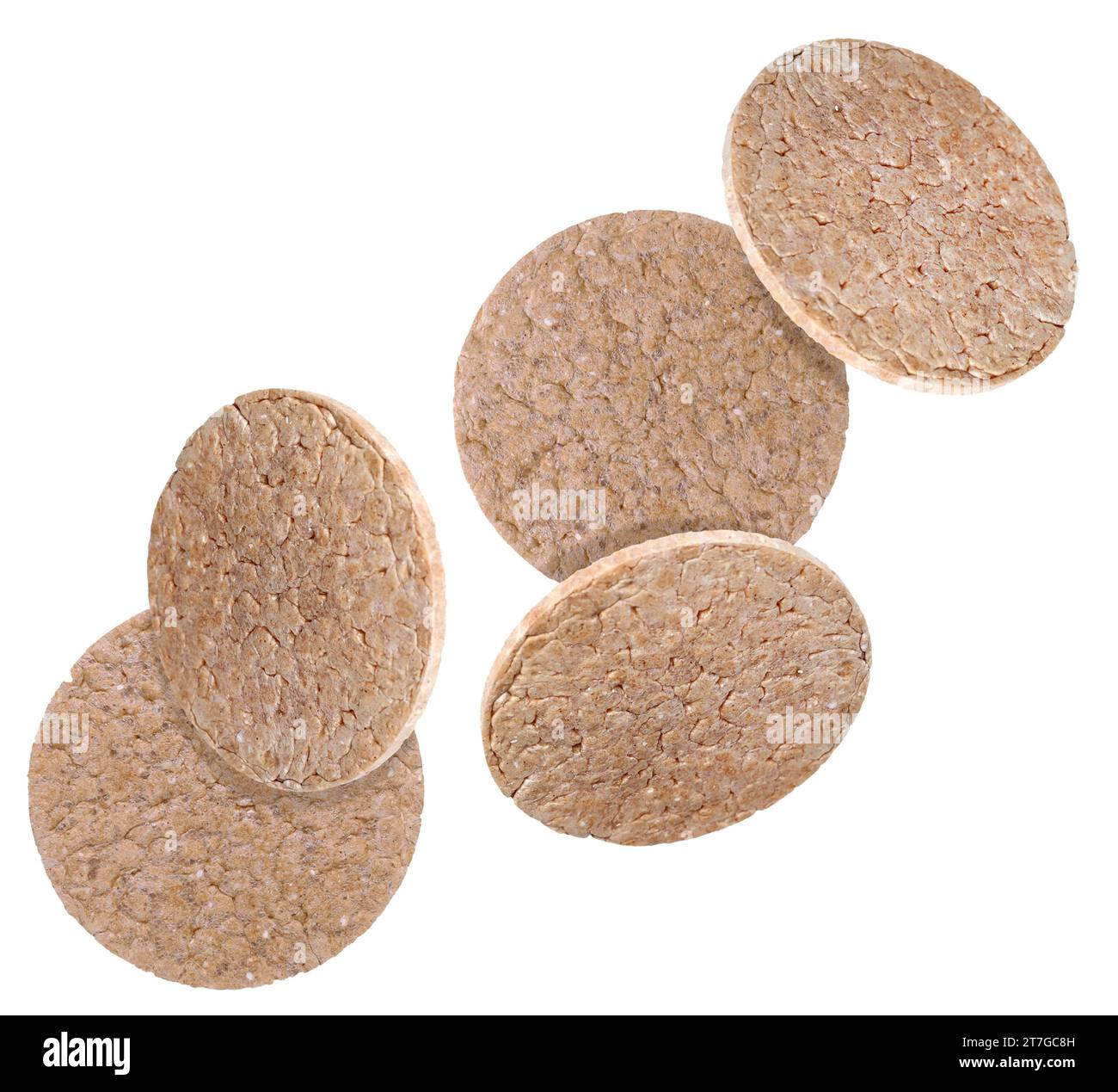 Many tasty crispbreads falling on white background Stock Photo - Alamy