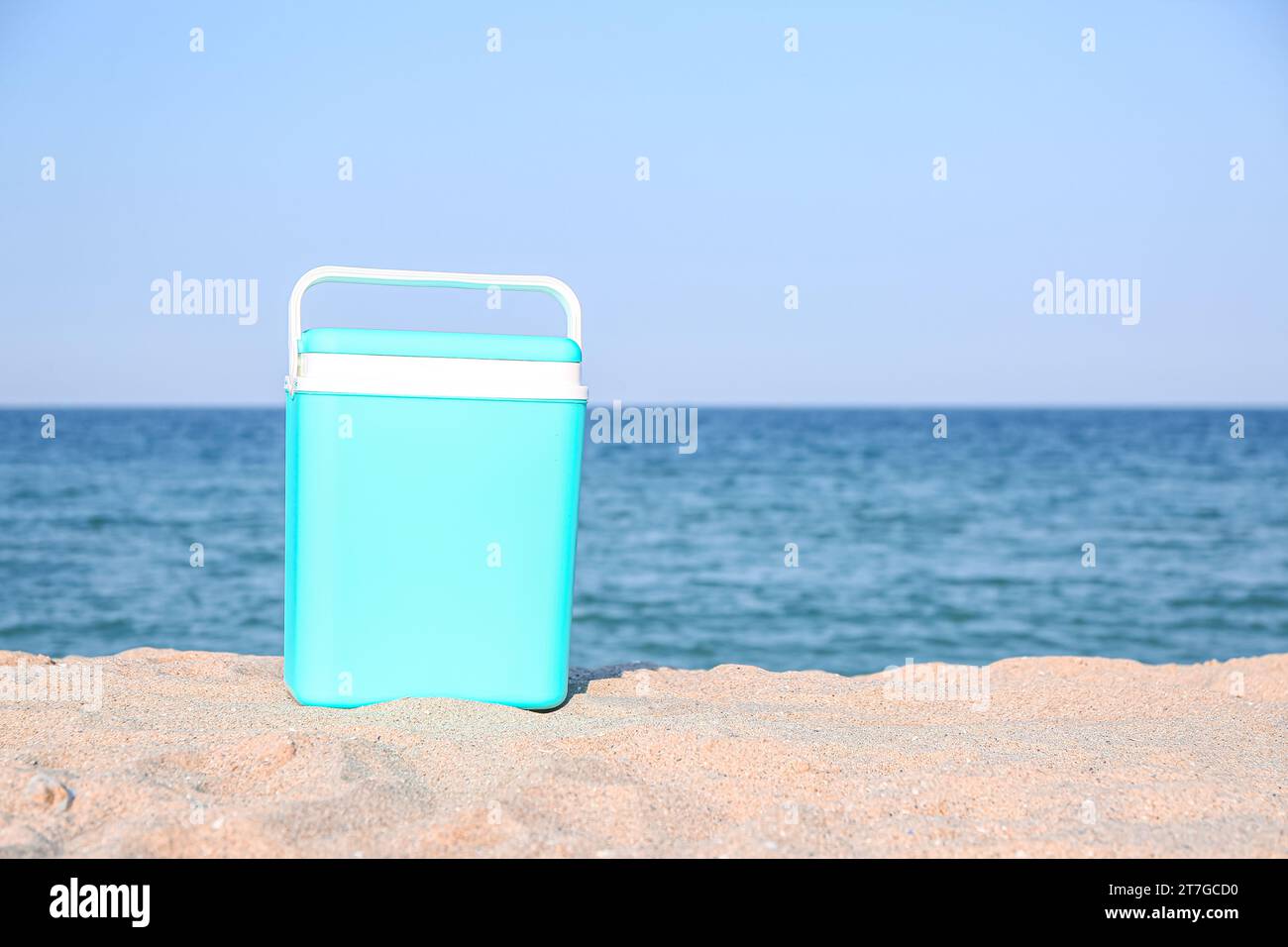 Modern beach cooler on sand Stock Photo - Alamy