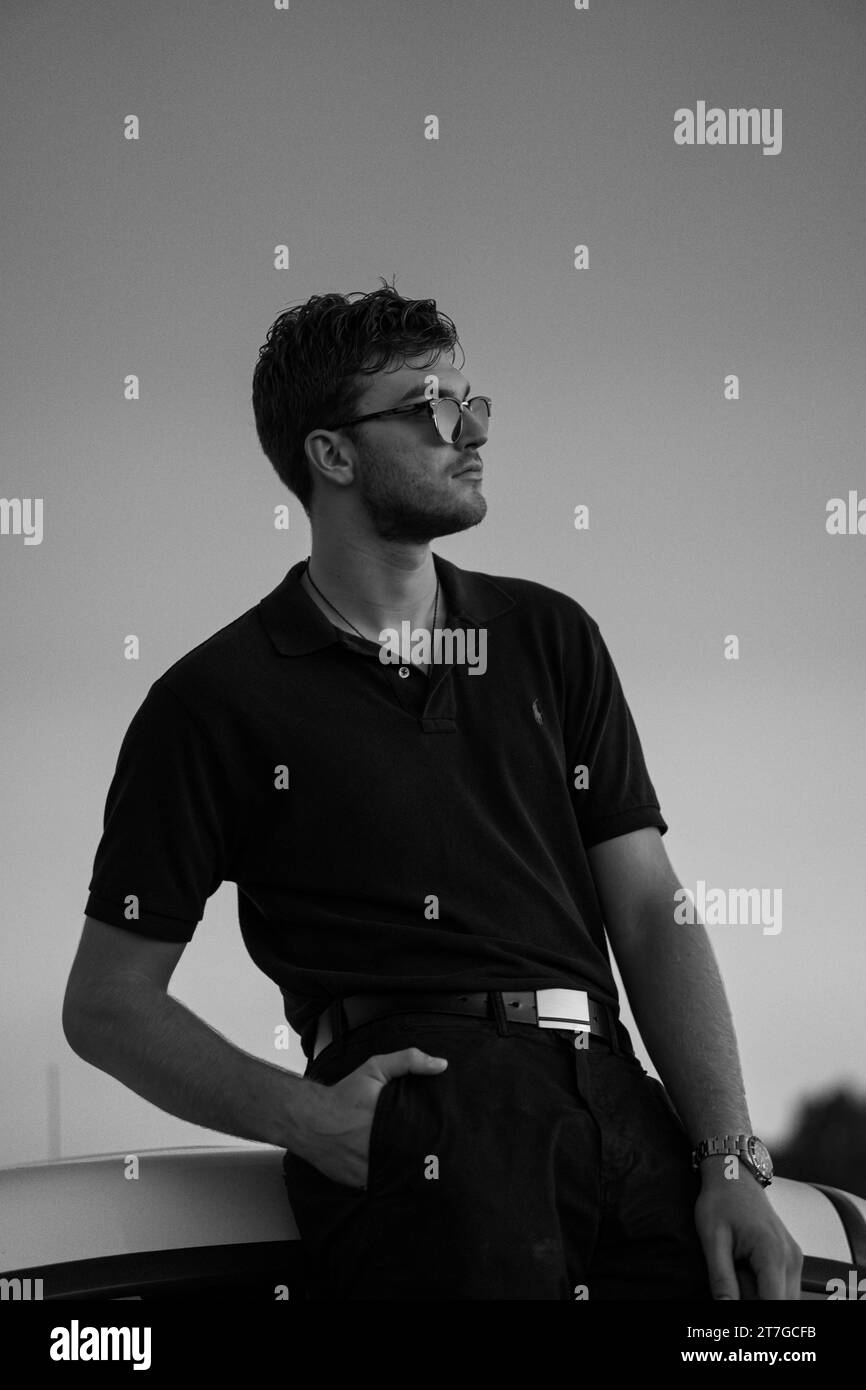 Man looking watch in Black and White Stock Photos & Images - Alamy