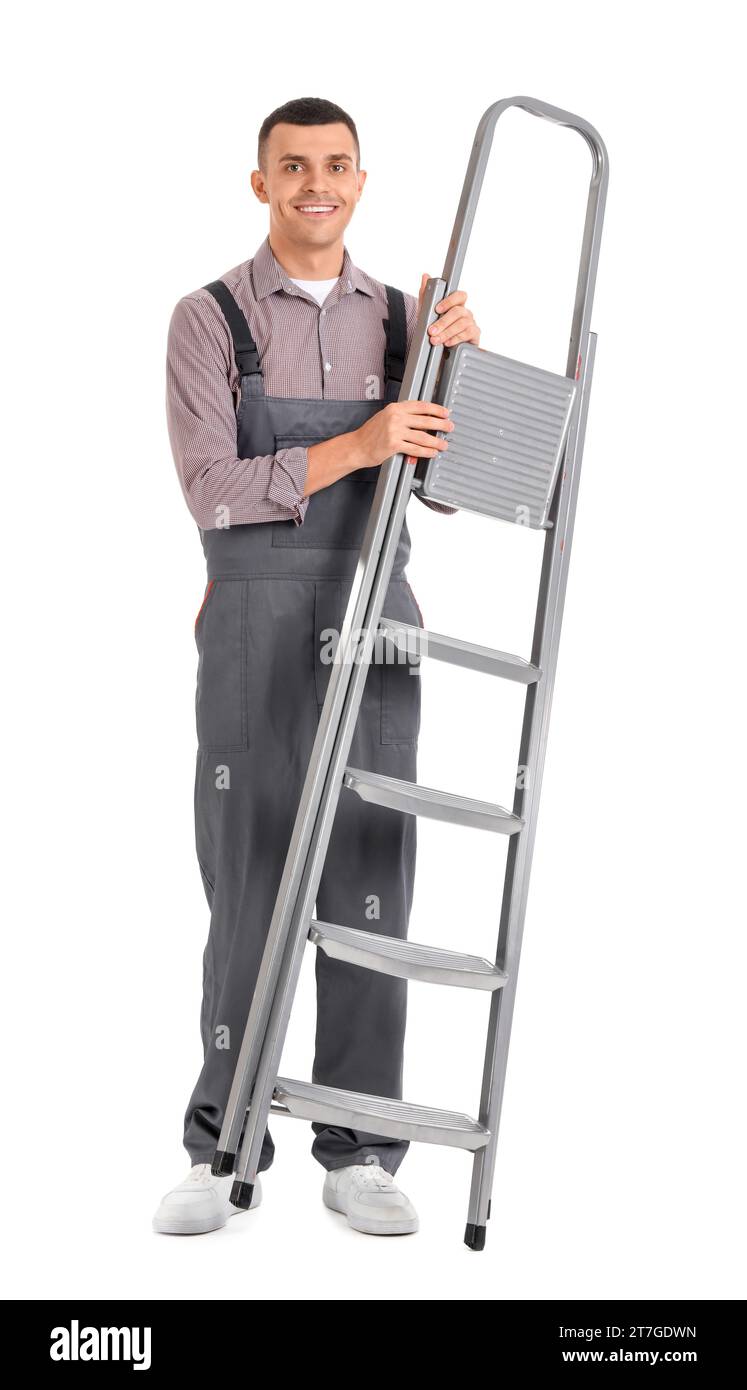 Young loader carrying stepladder on white background Stock Photo - Alamy