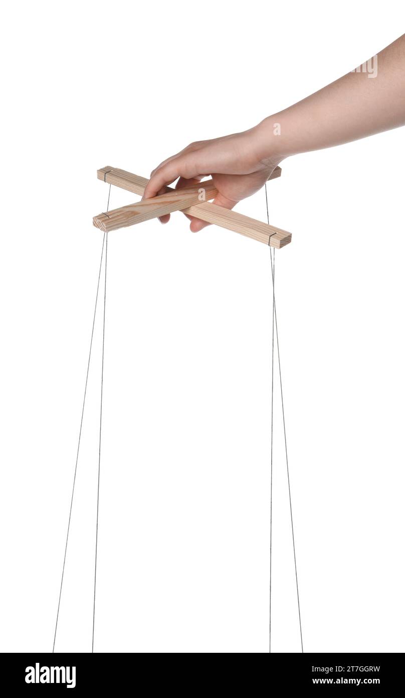 Woman pulling strings of puppet on white background, closeup Stock ...