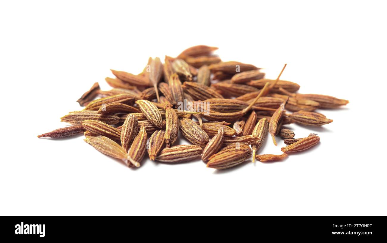 Heap of aromatic caraway (Persian cumin) seeds isolated on white Stock ...