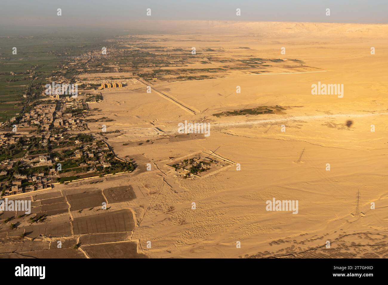 Aerial view of lush irrigated nile river valley meeting the dry arid ...