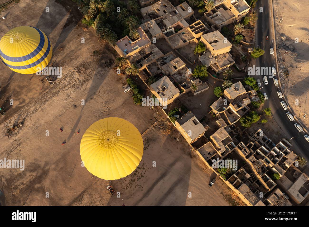Top down Aerial view of hot air balloons floating over the intersection ...