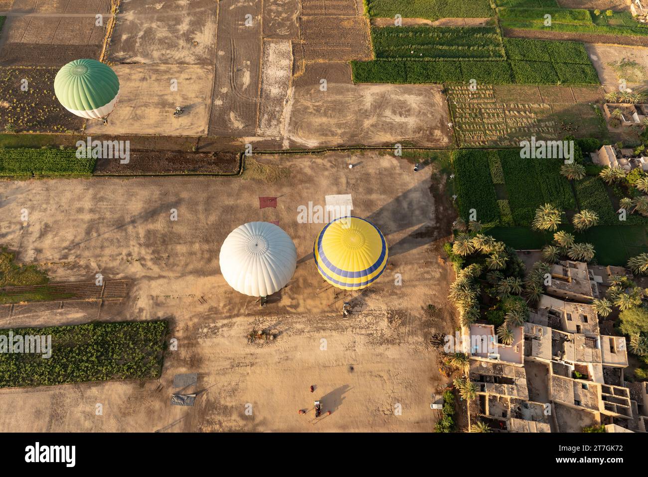 Top down Aerial view of hot air balloons floating over the intersection ...