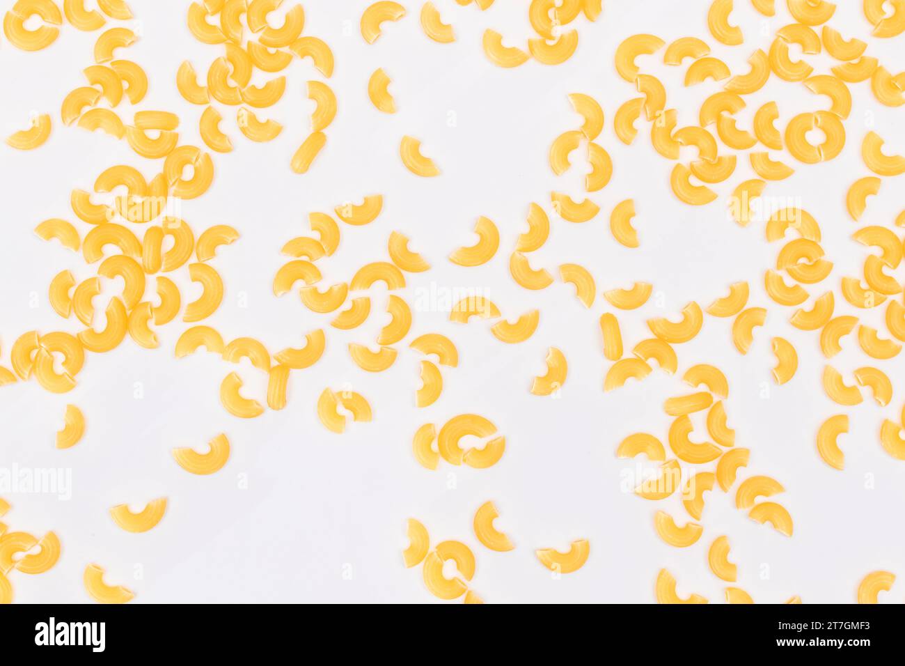 Scattered Uncooked Chifferi Rigati Pasta on White Background. Fat and ...