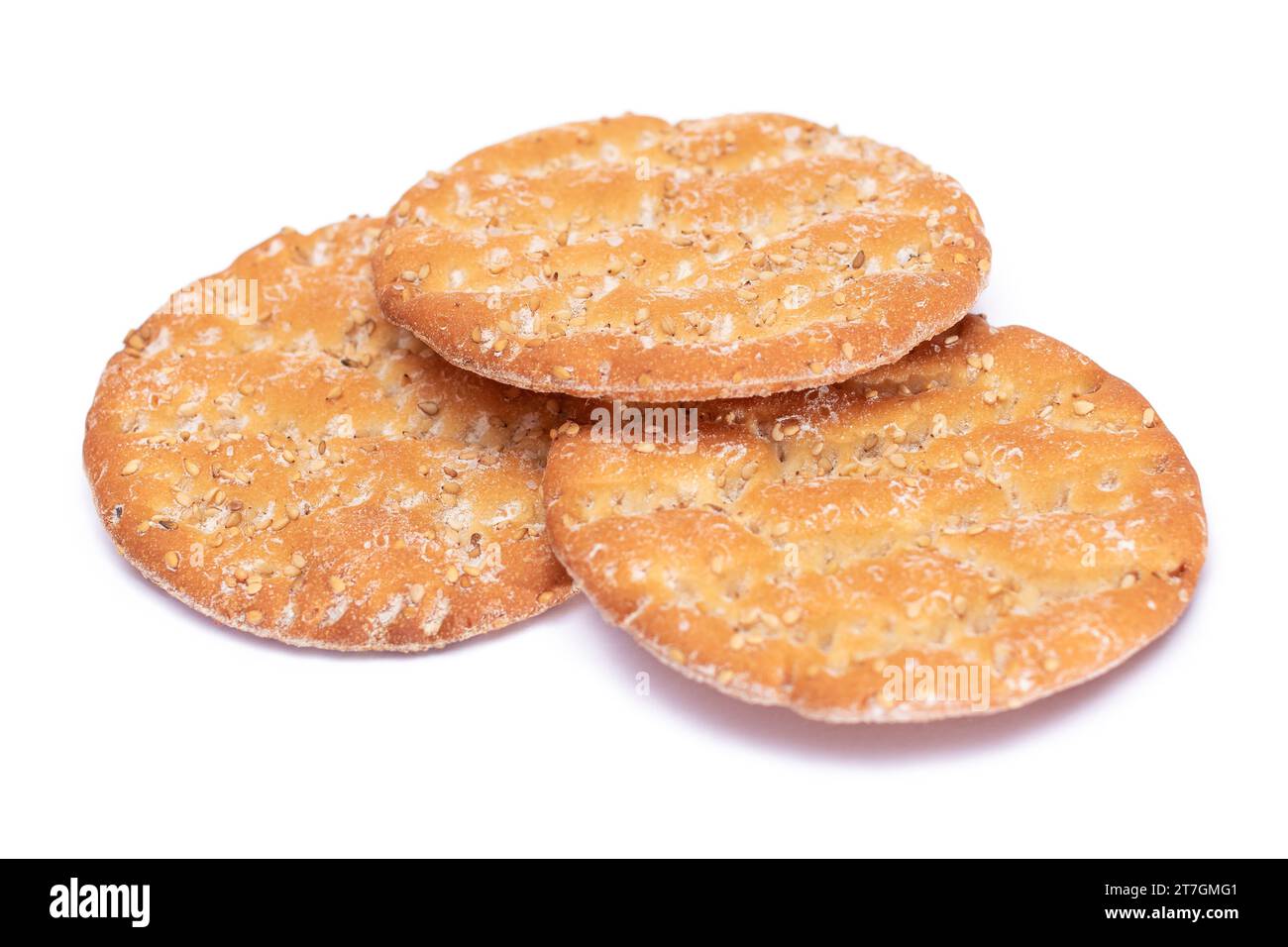 A Heap of Round Salt Crackers with Sesame Isolated on White Background ...