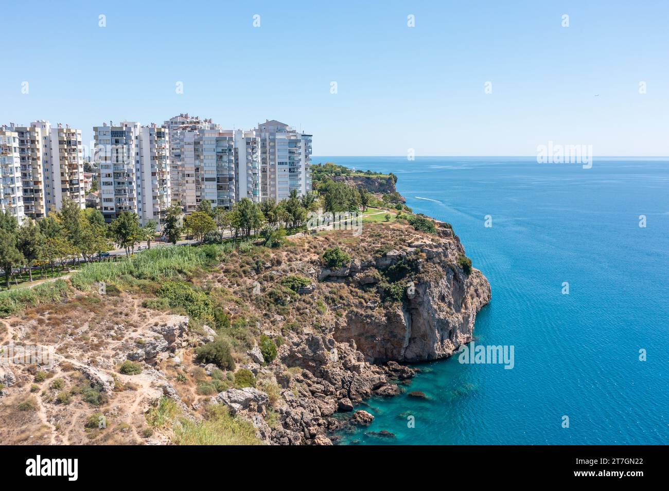 View of an urban area with multi-storey buildings on the rocky coast of ...