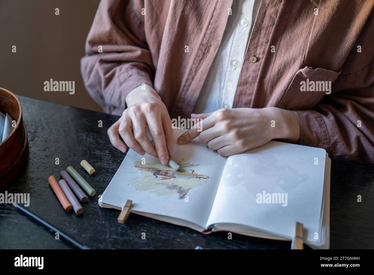 Hands of illustrator, cartoon artist, visual designer working in studio ...