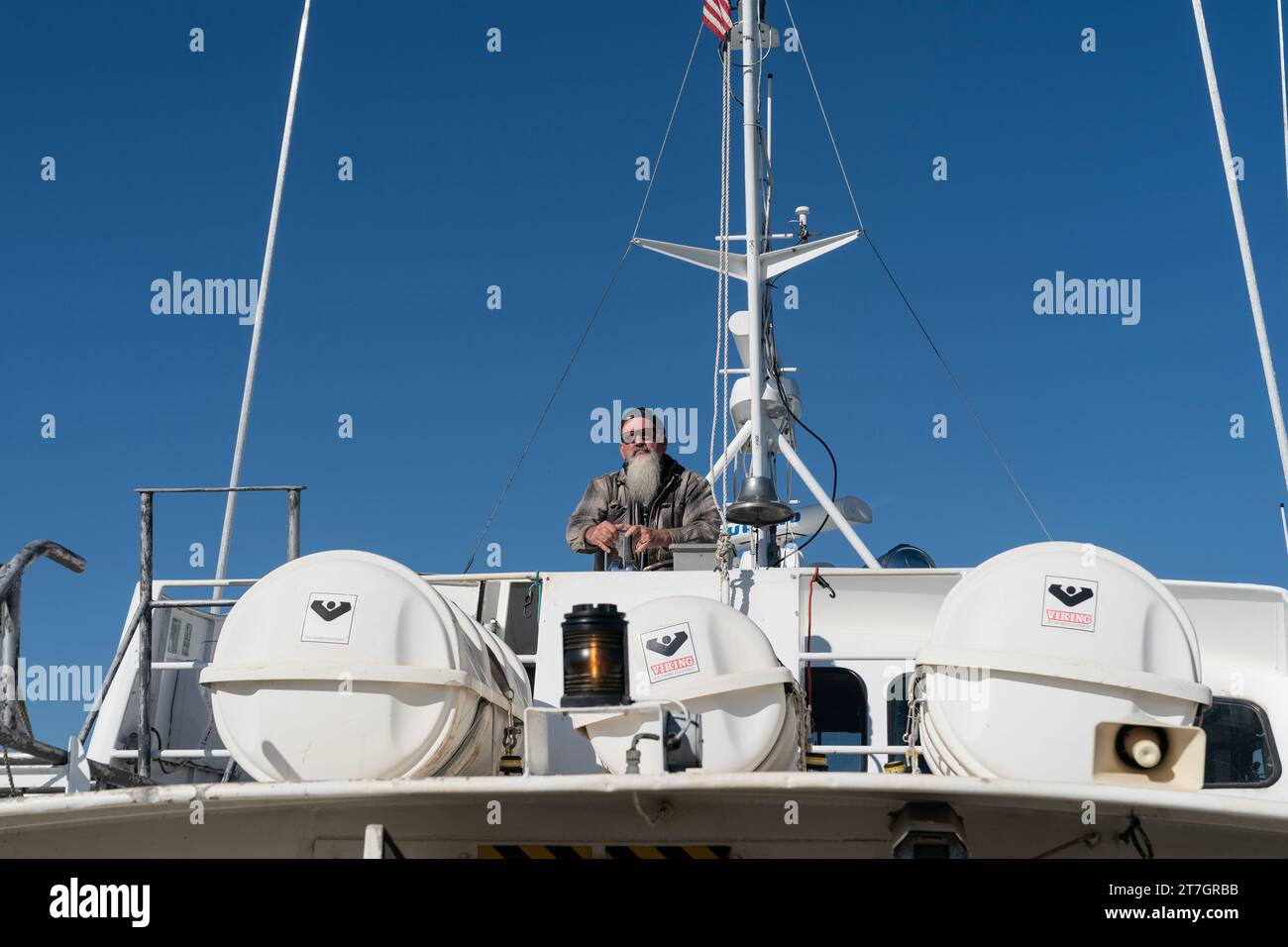 Captain of ferry between The Bronx City Island and Hart Island Phil ...