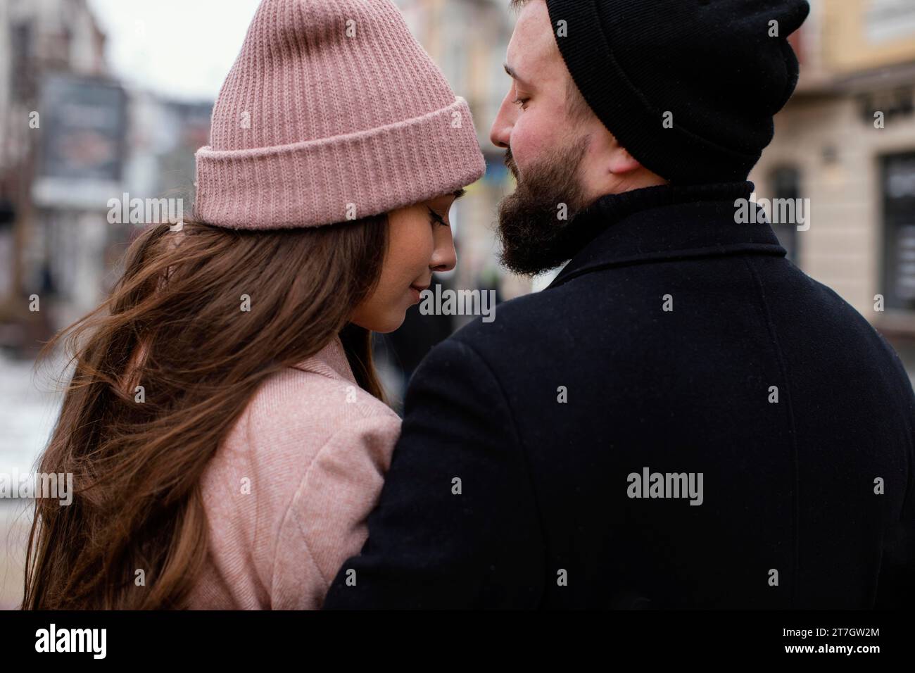 Back view couple outdoor hugging Stock Photo - Alamy