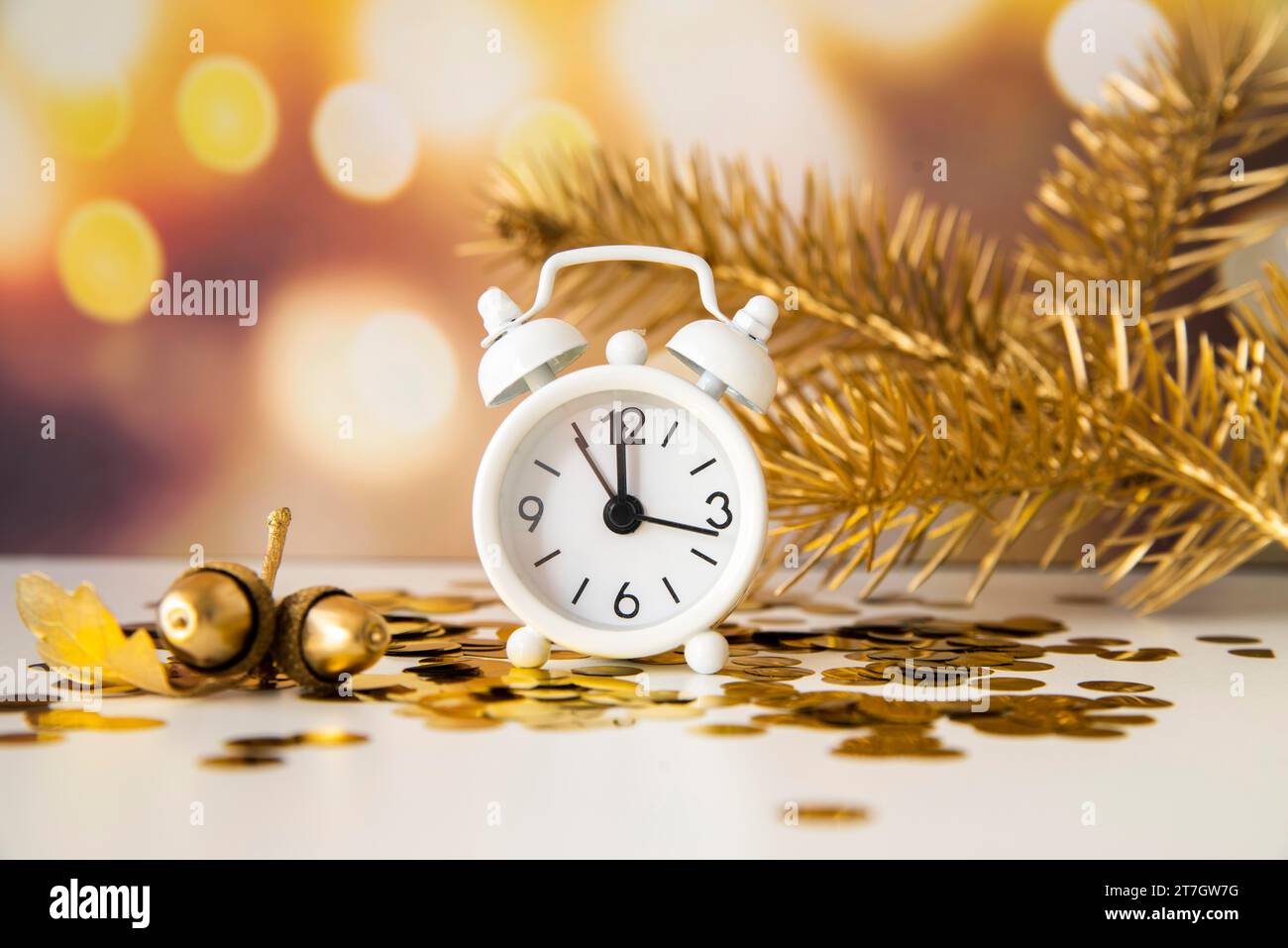 Beautiful arrangement with clock showing midnight pine trees Stock ...