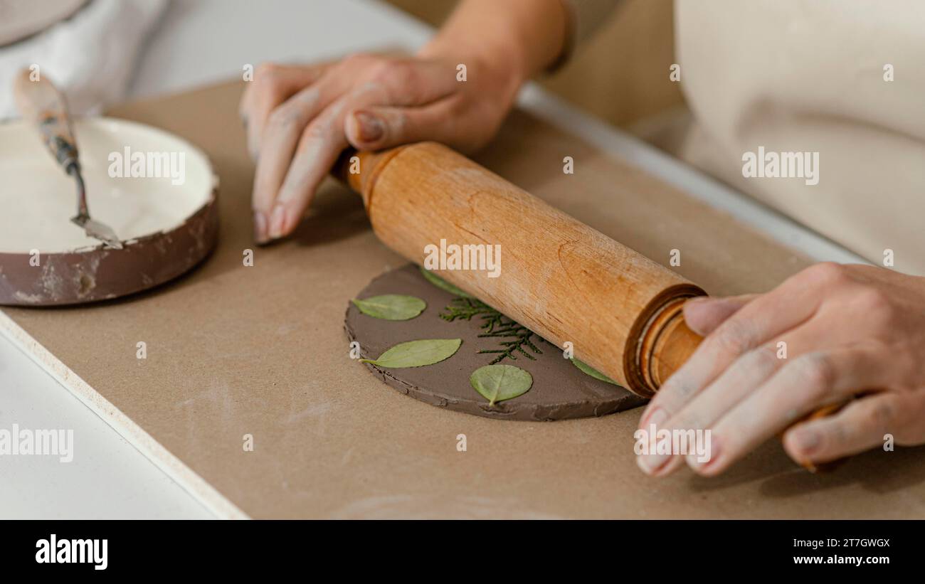 Close up hands using rolling pin Stock Photo - Alamy