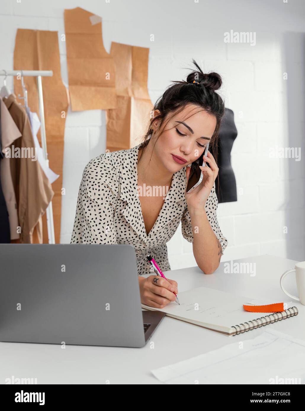 Female designer working her workshop 3 Stock Photo - Alamy