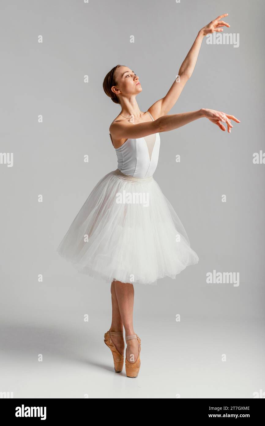 Full shot beautiful woman performing ballet Stock Photo - Alamy
