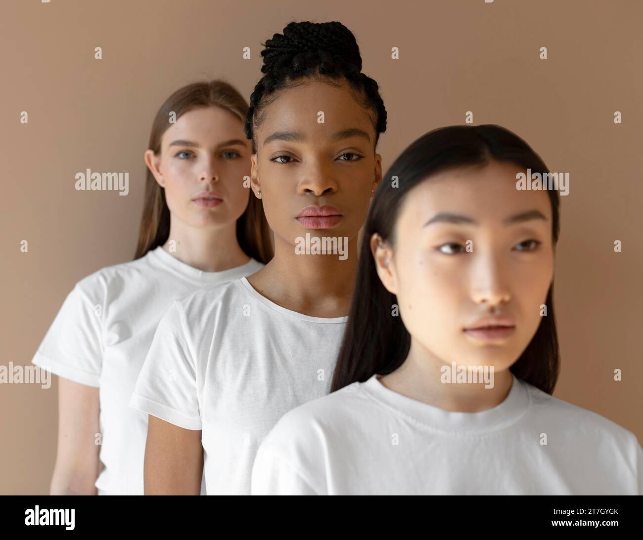 Multicultural women posing Stock Photo - Alamy