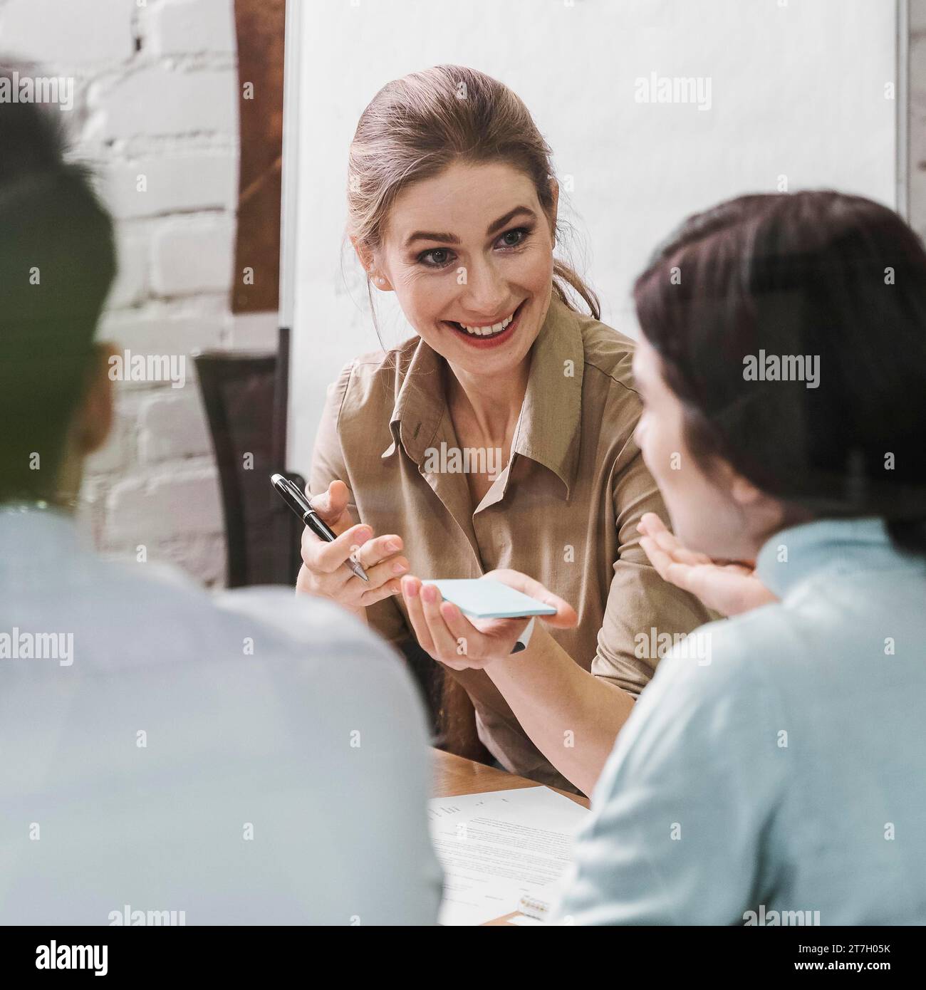 Team young smiley businesspeople during meeting presentation Stock ...