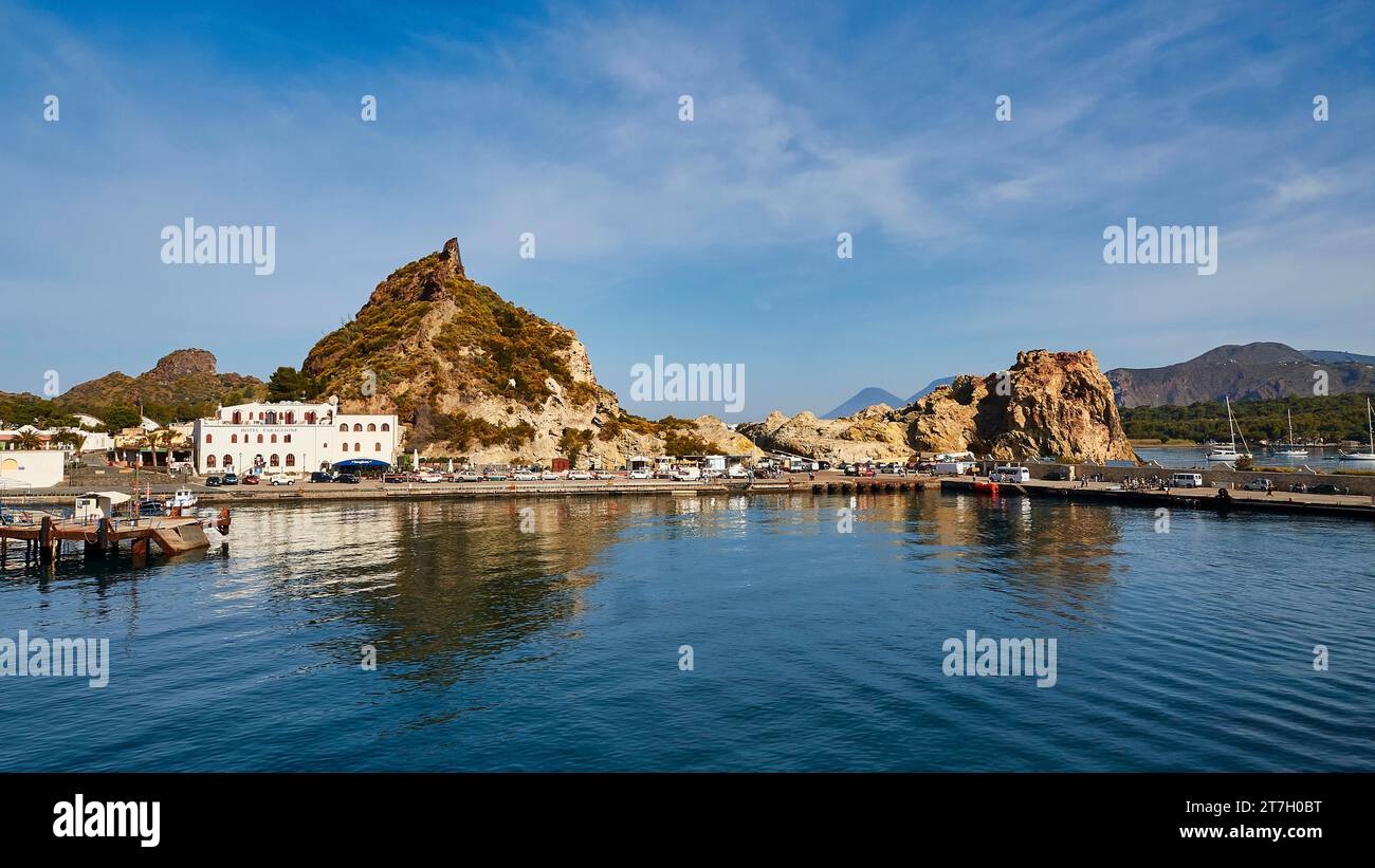 Harbour, jetty, white buildings, bizarre lava hill, Vulcano, Aeolian ...
