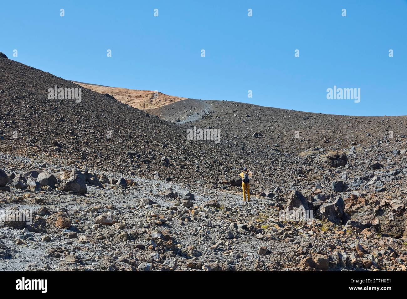 Grey lava landscape, single human, grey lava boulders, crater, Vulcano ...