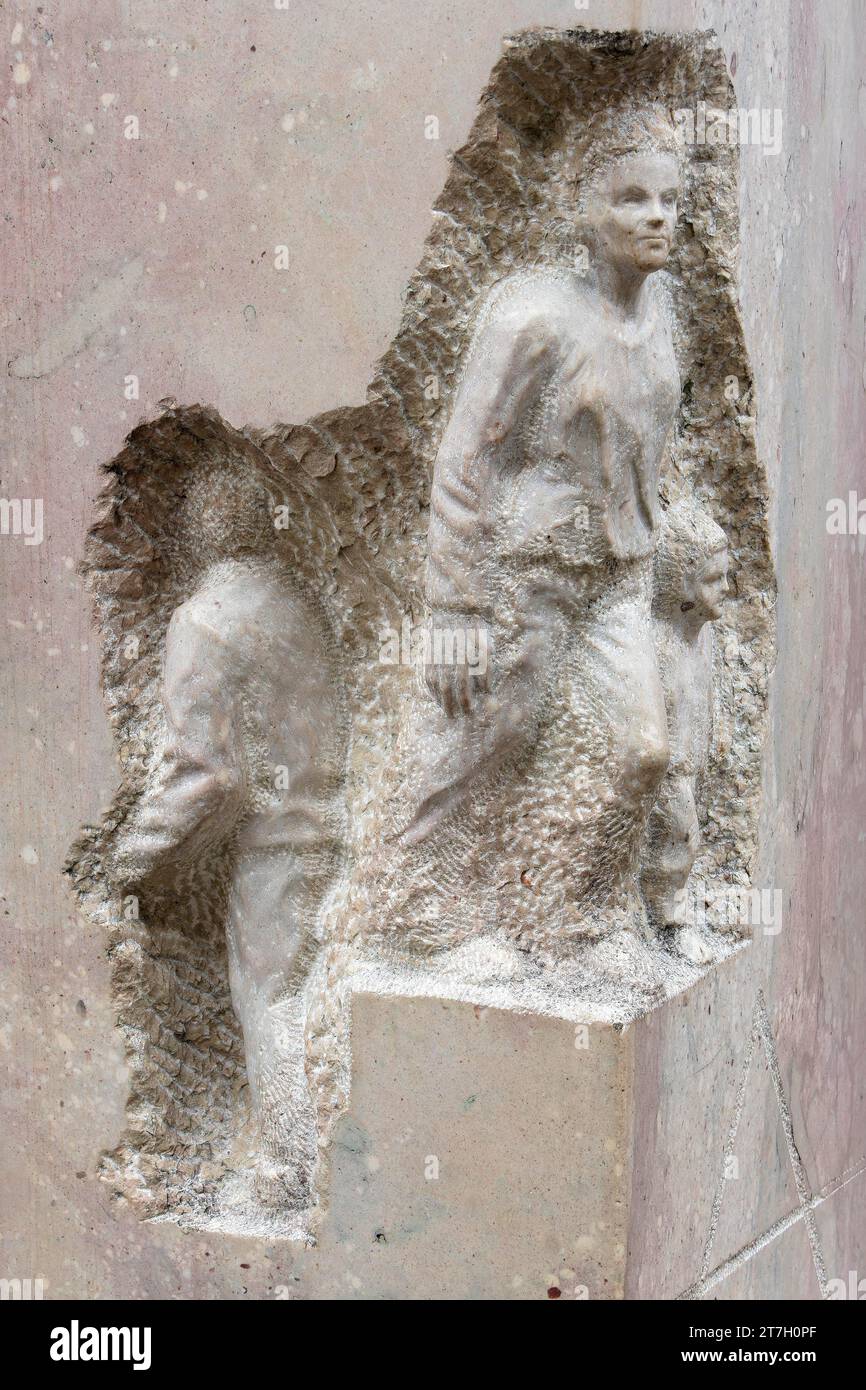 Detail with a carved stone figure on a stone column from the monument ...