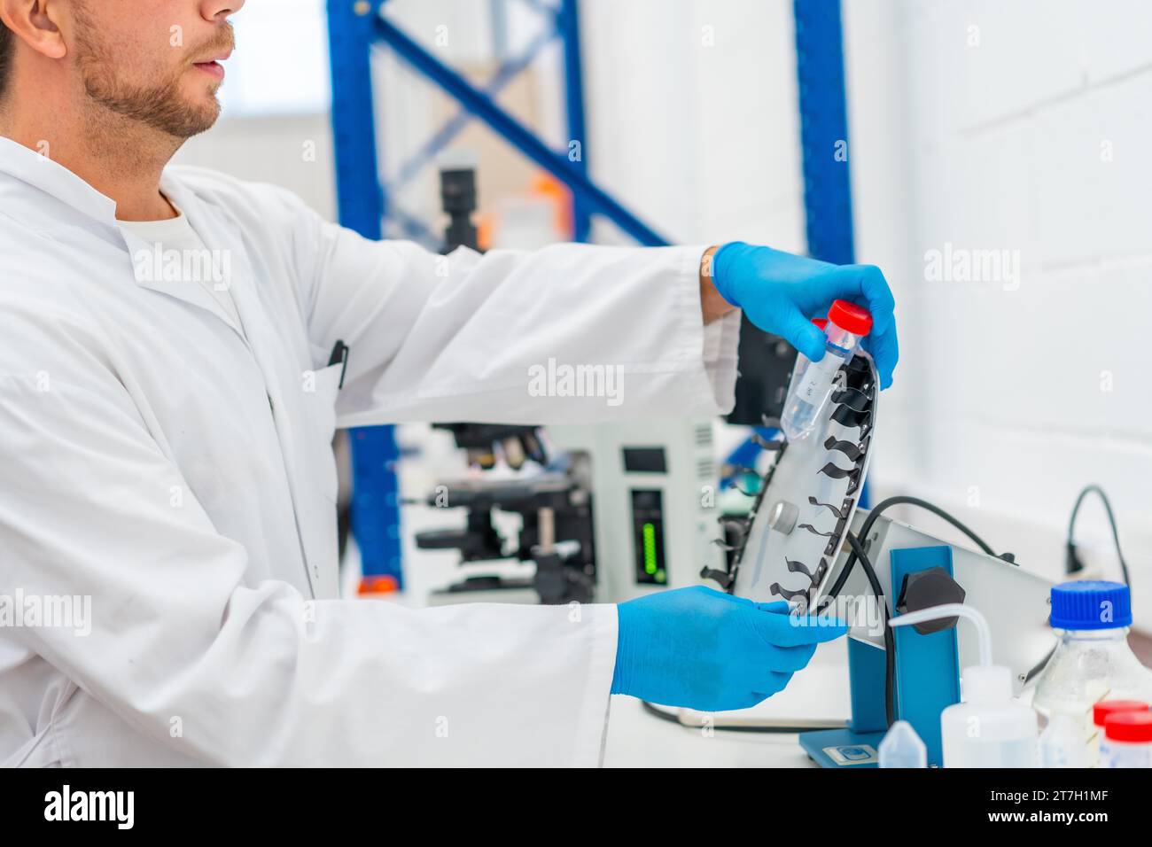 Cropped photo of the side view of a scientist working on cancer cure ...