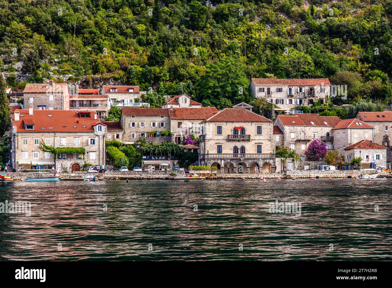 The former seafaring centre of Perast with its magnificent buildings ...