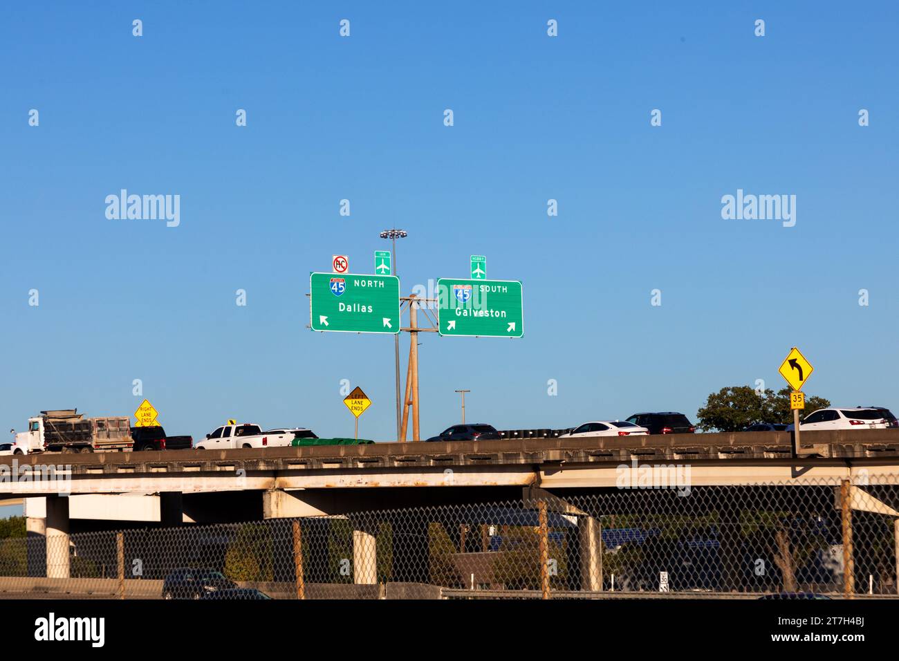 highway 45 with direction signage Dallas and Galveston under blue sky ...