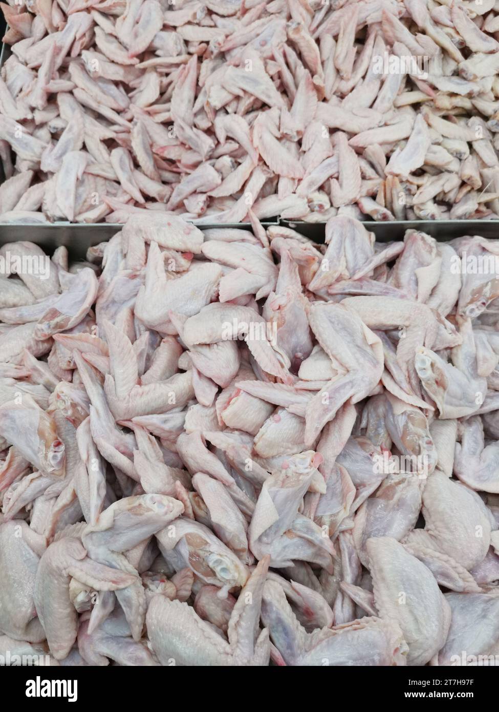 Fresh chicken wings in a supermarket Stock Photo - Alamy